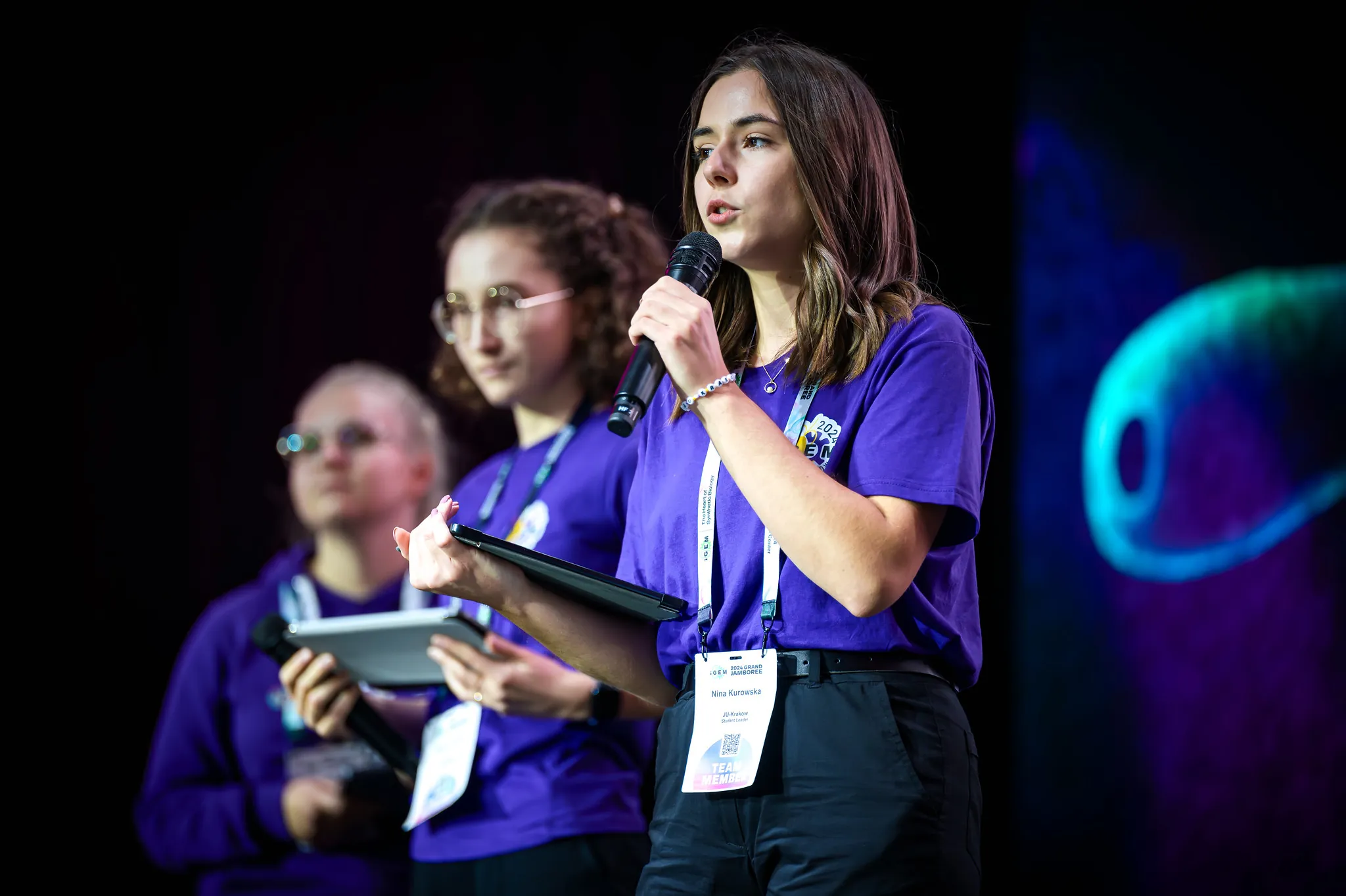 Team presenting on stage
